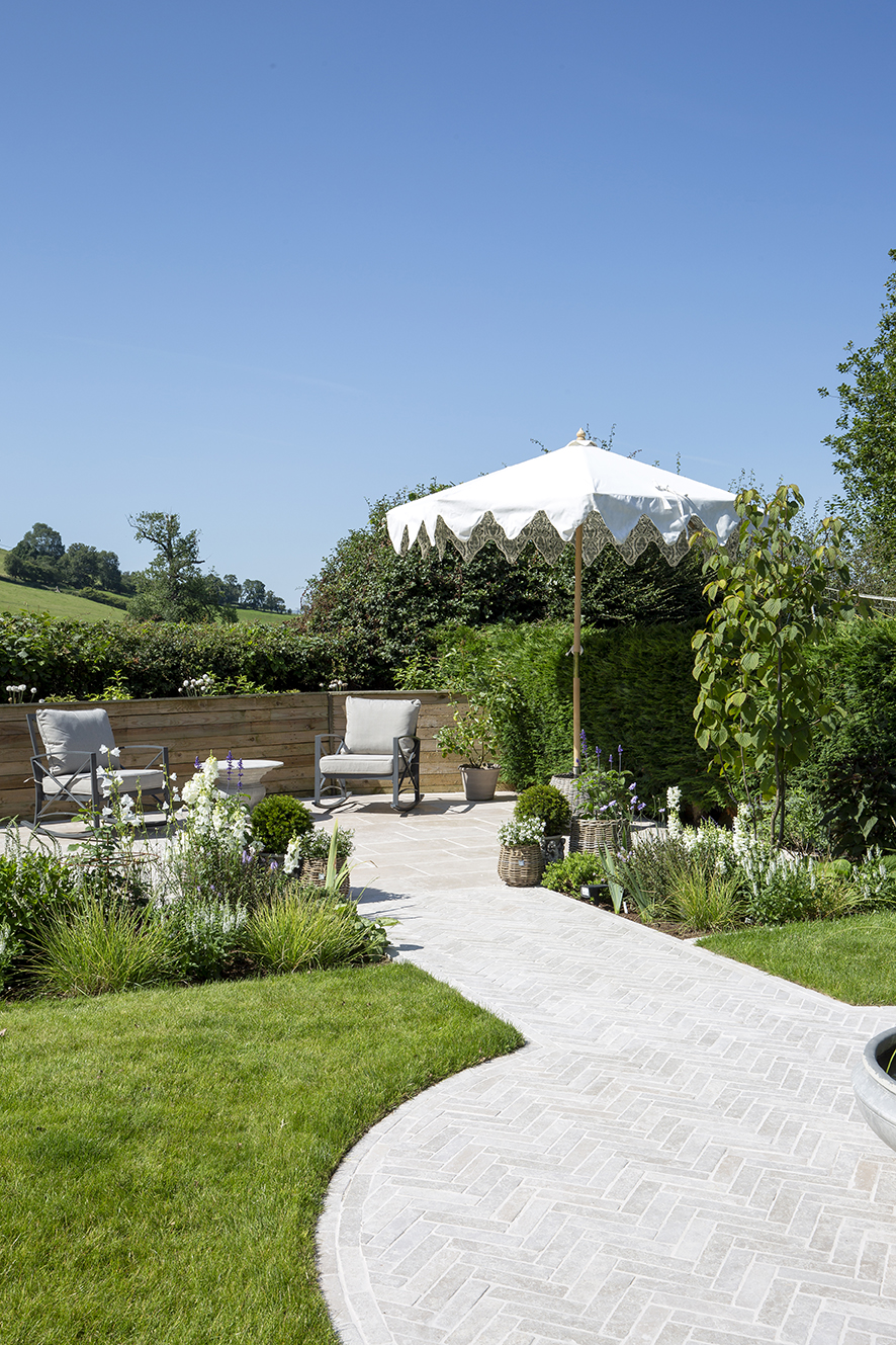 Step Inside a Country Garden with Dijon Herringbone Tiles